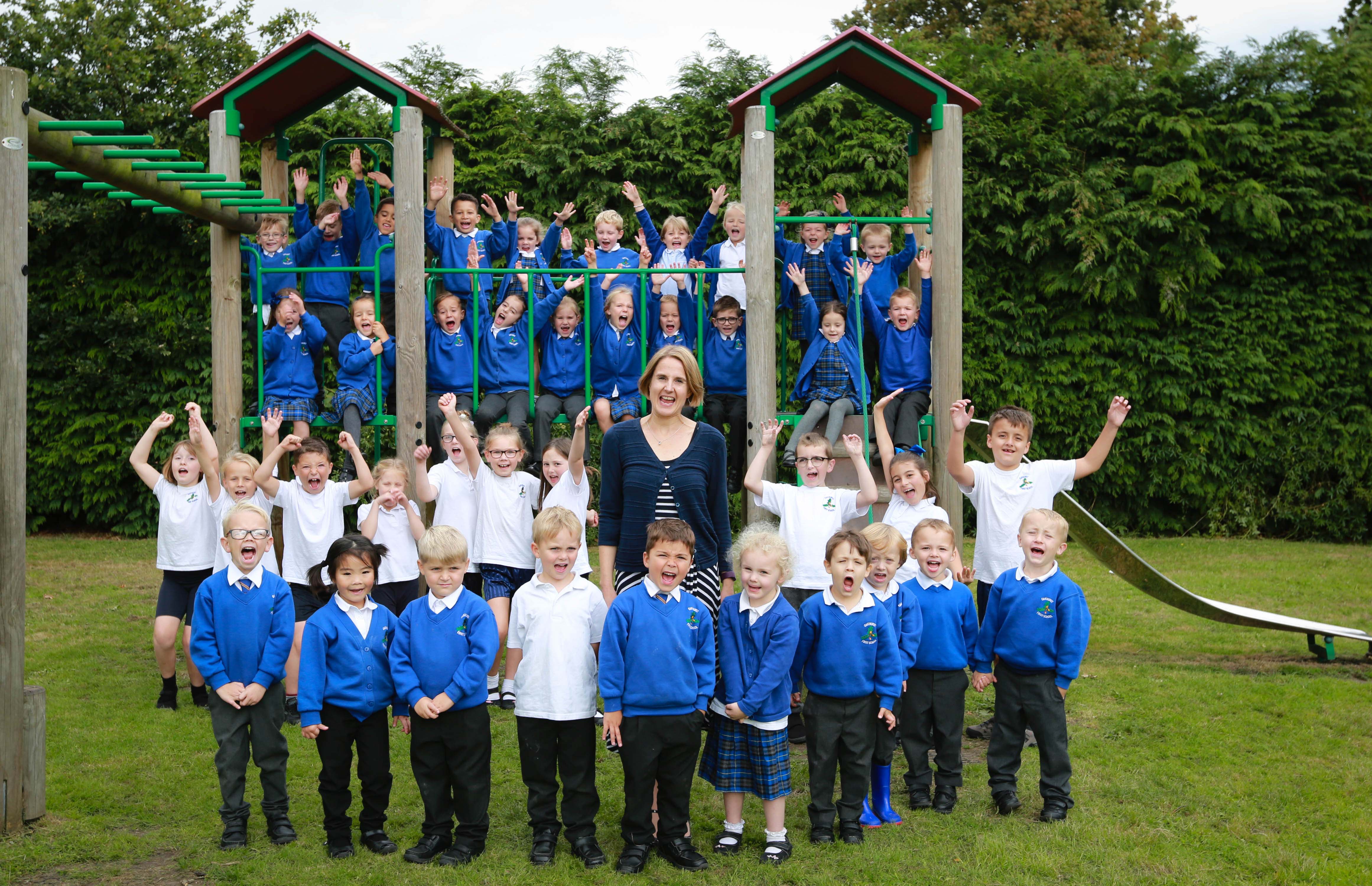New headteacher at Oakhurst First School Ann Clark pictured with pupils ...